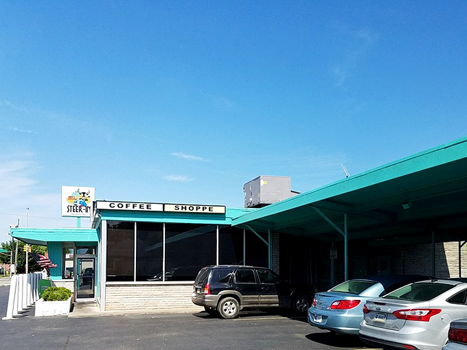 Morning light bathes the iconic turquoise exterior, promising a day that starts right&mdash;with pancakes, eggs, and conversation that flows as freely as the coffee.