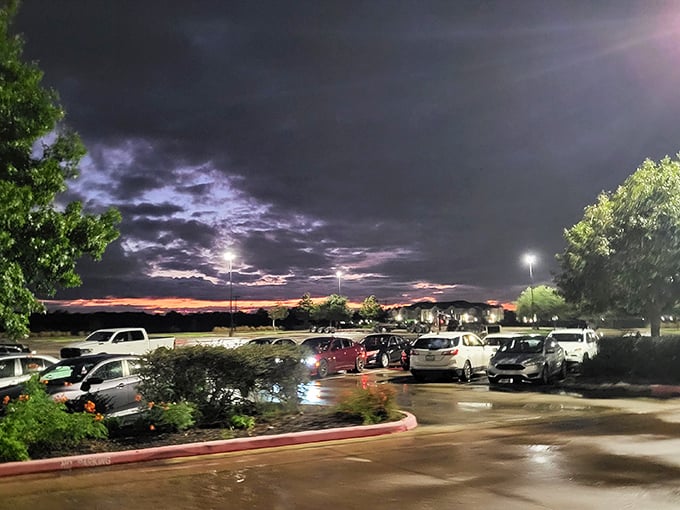 Evening parking lots tell the story of successful shopping days, filled with satisfied customers heading home.
