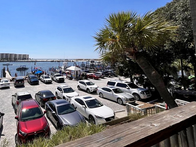 That view from the deck isn't just a parking lot&mdash;it's the prelude to adventure, with boats bobbing in the harbor beyond. 