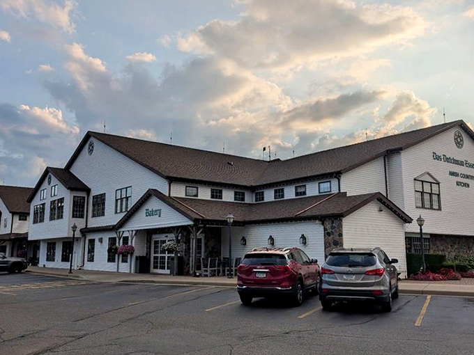 As evening approaches, the sprawling complex takes on a golden glow, tempting passersby with the promise of one more memorable meal.