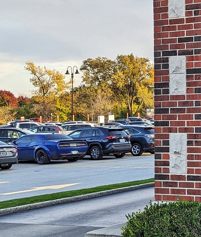 A packed parking lot tells you everything you need to know. When locals line up their cars like this, you've found the real deal.