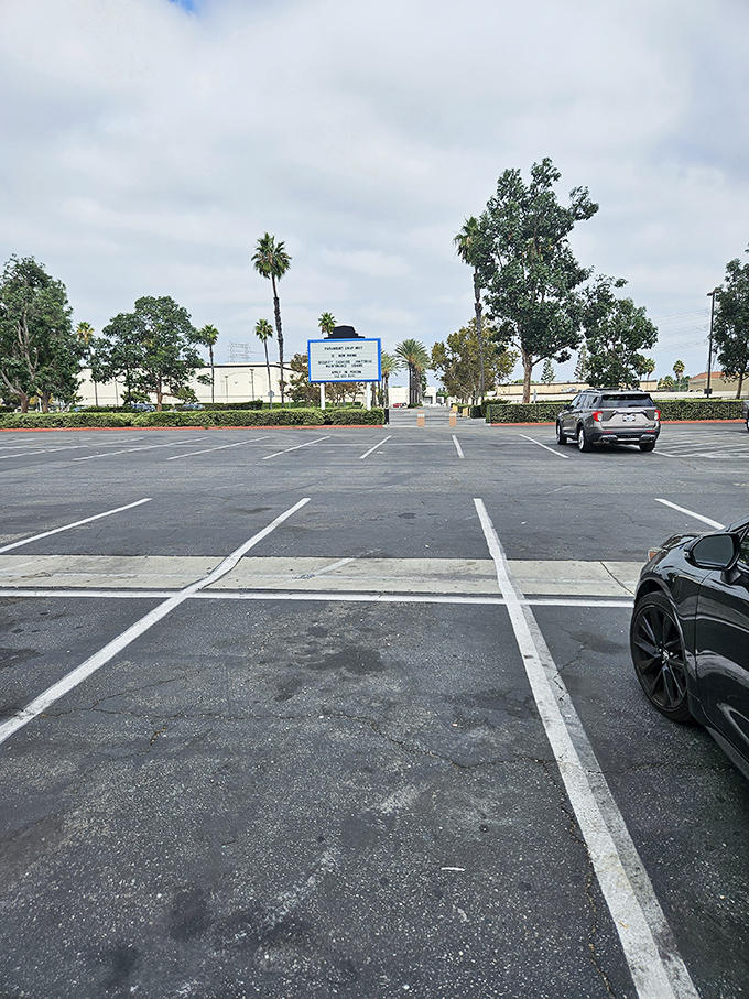 The empty parking lot awaits its weekend transformation into Southern California's ultimate treasure hunting destination annually.