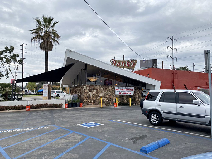 That sloping roof against the California sky&mdash;architectural poetry that announces "something special happens here" before you even park your car.
