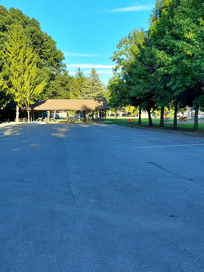 The parking area leads to picnic shelters and playgrounds beyond, where memories wait to be made under Ohio's generous sky.