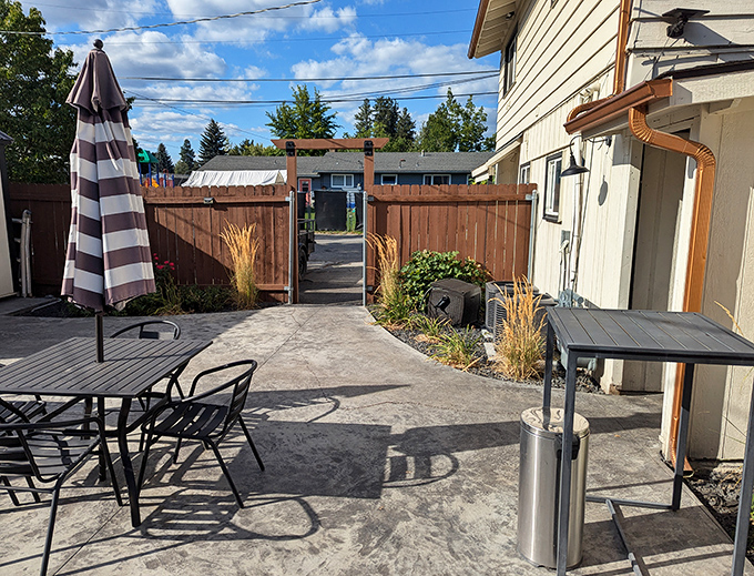 The hidden patio offers an outdoor sanctuary for pie consumption. Those wooden gates might as well be portals to a secret garden of dessert contemplation.