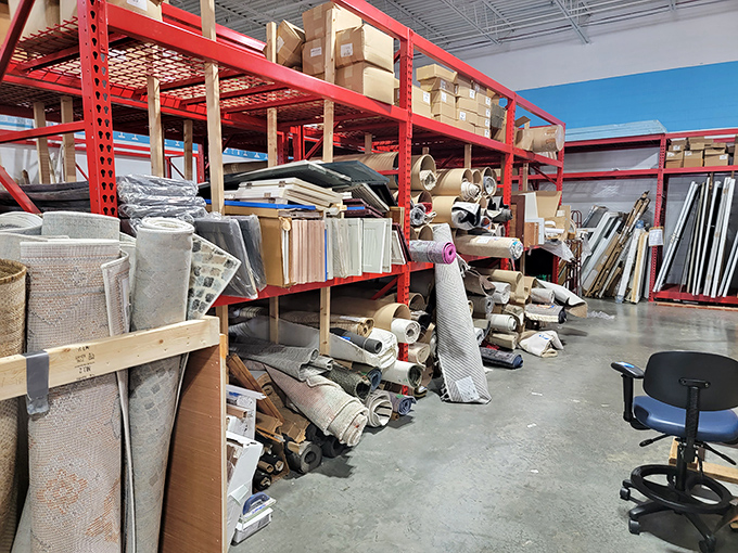 Rolls of carpet and area rugs stand ready to soften floors and muffle footsteps at prices that make home improvements accessible.