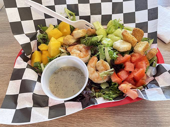 A salad that doesn't feel like punishment. Those mangoes and shrimp are having such a good time together, the lettuce is just happy to be included.
