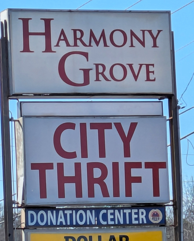 The Harmony Grove sign stands tall, a landmark guiding thrift enthusiasts to their secondhand sanctuary.