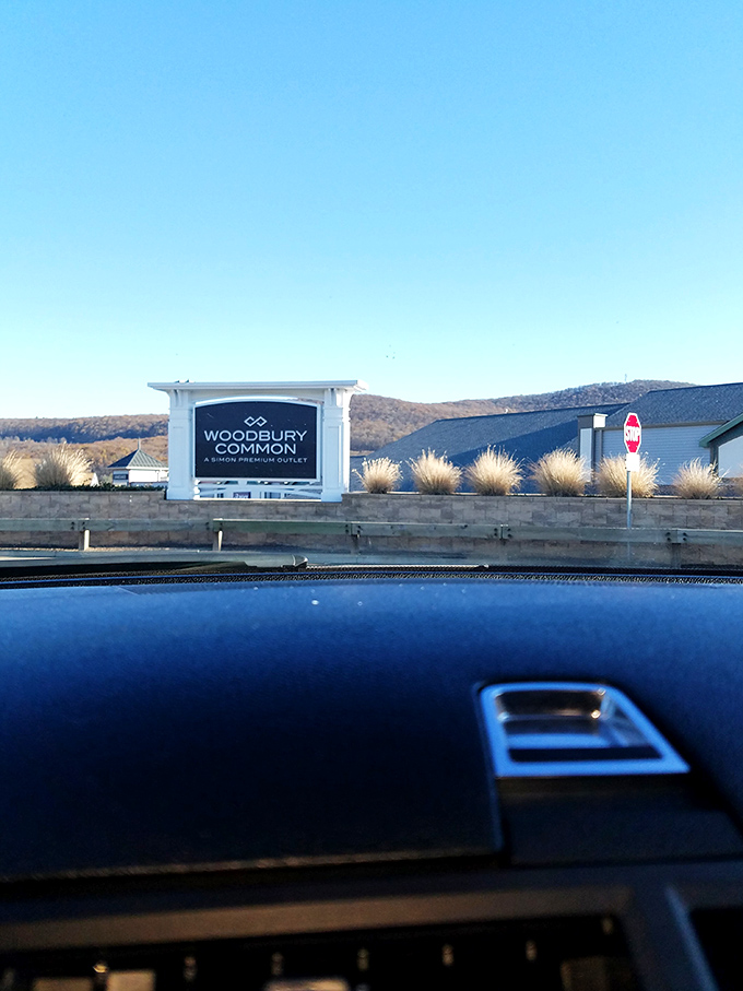 Approaching Woodbury Common Premium Outlets, another Connecticut shopping destination. The dashboard view every dedicated bargain hunter recognizes as retail paradise on the horizon.