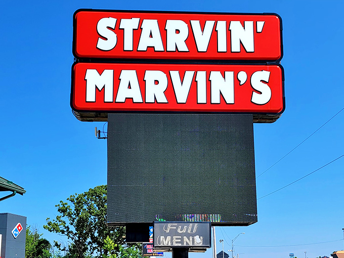 The sign that's launched a thousand appetites&mdash;bold red letters against blue sky, a beacon of hope for the truly hungry.