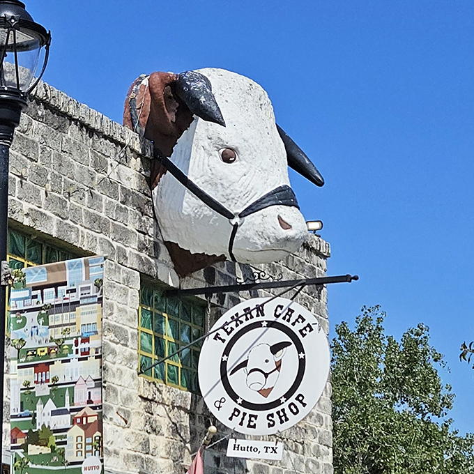 That cow head sign against the Texas sky says everything you need to know: you've arrived somewhere special, and you're about to eat very, very well.