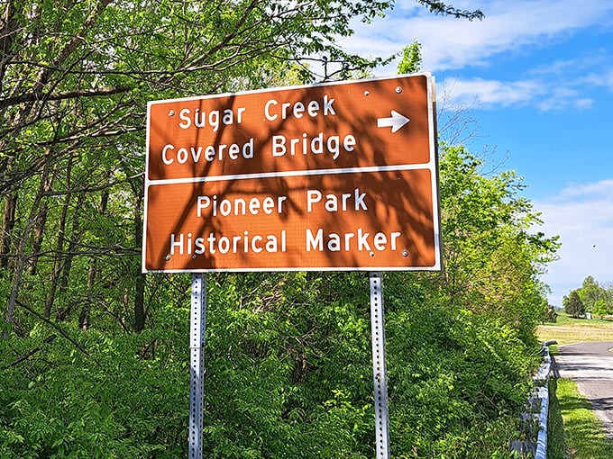 Brown signs with white lettering point the way&mdash;the universal symbol for "something worth seeing this exit" on America's backroads.