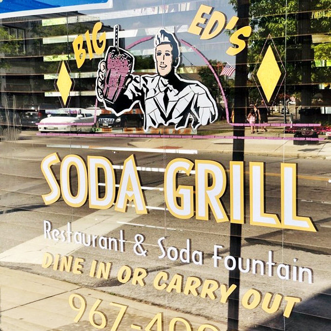 That vintage window sign with its soda jerk illustration isn't just advertising&mdash;it's a promise that some wonderful traditions are worth preserving forever.