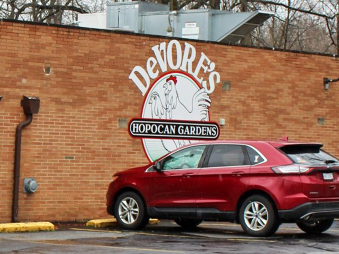 Even the parking lot sign knows it's all about that chicken&mdash;no false modesty here.