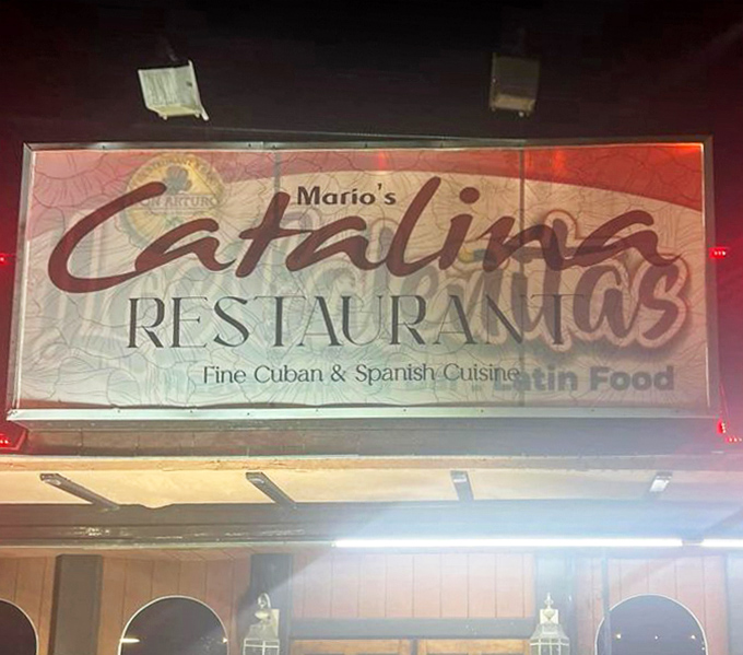 The sign doesn't just announce a restaurant &ndash; it promises "Fine Cuban & Spanish Cuisine" that bridges two culinary worlds with delicious authority.