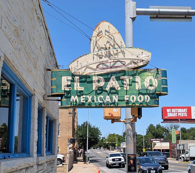 That vintage sign has guided hungry Austinites through decades of cravings. The blue trim and weathered edges aren't age&mdash;they're credentials in a city that changes daily.