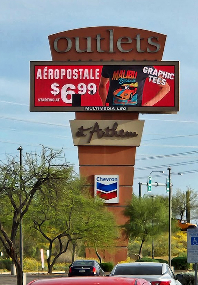 The beacon of bargains visible from the highway, luring in shoppers like a desert mirage that actually delivers.
