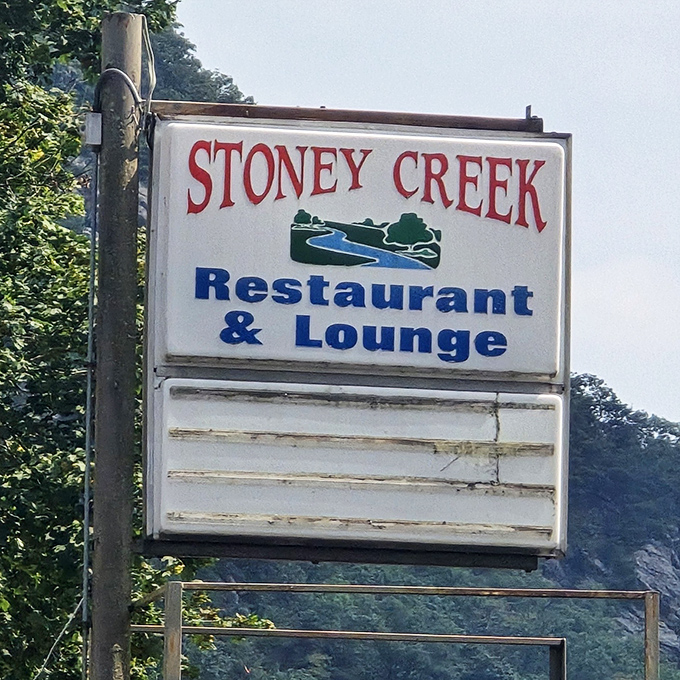 The sign stands like a beacon of hope for hungry travelers&mdash;simple, straightforward, and promising exactly what you need.