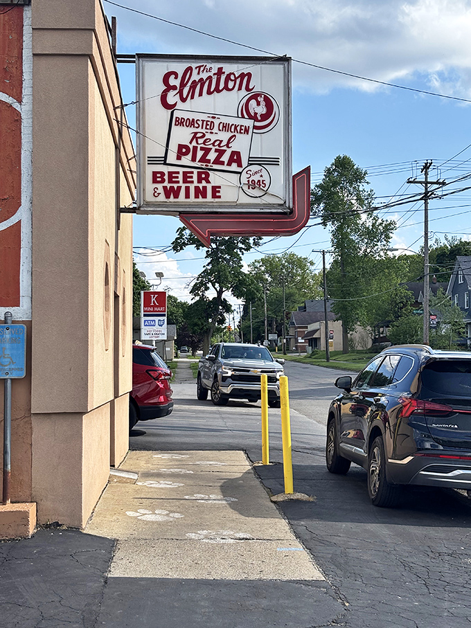 The iconic sign promises exactly what awaits inside &ndash; broasted chicken, real pizza, and an authentic slice of Ohio dining history.