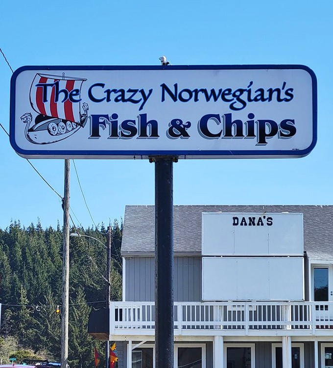 A sign featuring a Viking ship that promises seafood adventure. Like Columbus setting sail, but with much tastier discoveries waiting.