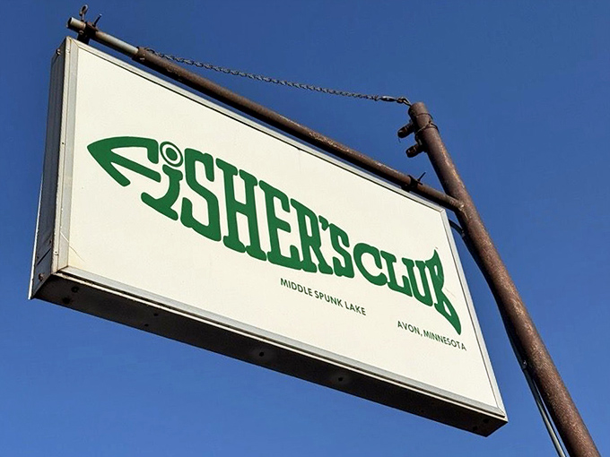 The iconic Fisher's Club sign stands as a beacon of hope for hungry travelers and a symbol of Minnesota's lake culture legacy.