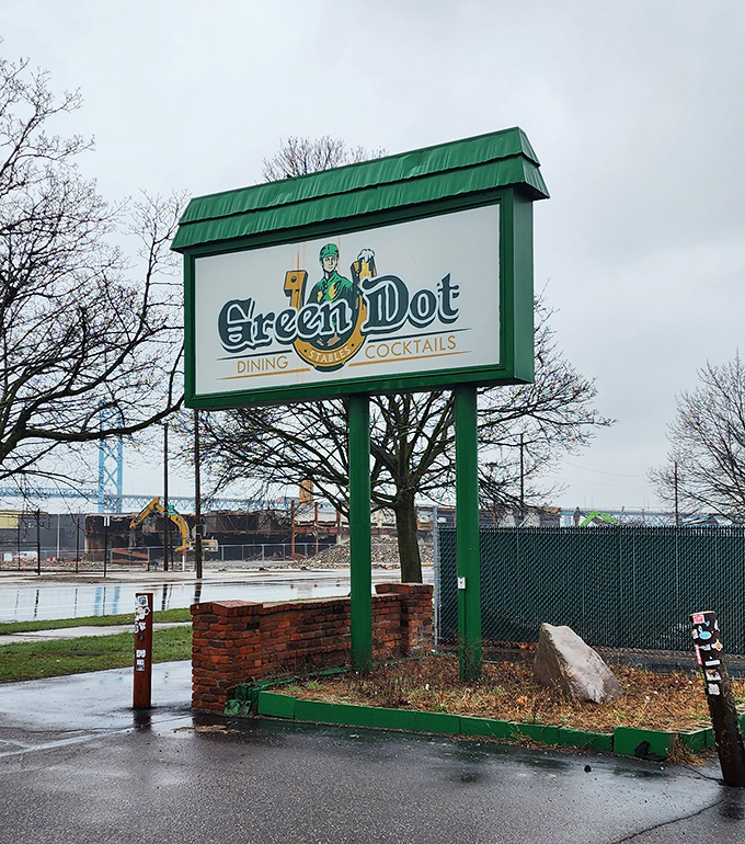 The sign that started countless culinary journeys &ndash; simple, green, and promising dining, cocktails, and memories worth making.