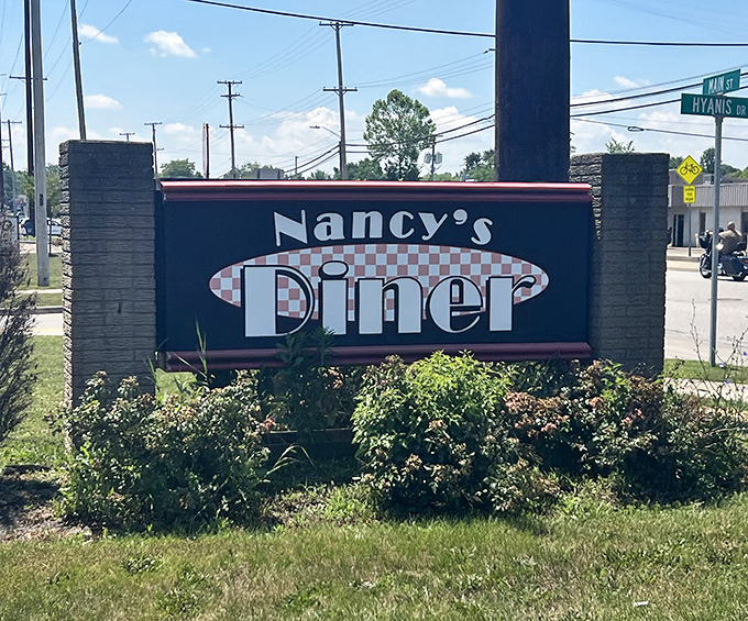 The sign announces Nancy's Diner with no pretension, just the quiet confidence of a place that knows exactly what it is&mdash;and what you're craving. 