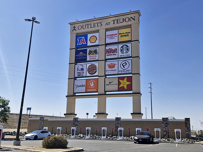 The towering sign stands like a retail lighthouse, guiding hungry shoppers to both bargains and burgers. A beacon of consumer hope.
