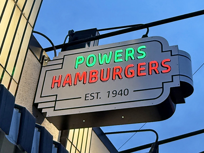 That neon sign doesn't just mark a restaurant—it's a beacon of hope for hungry travelers seeking burger salvation in downtown Fort Wayne.