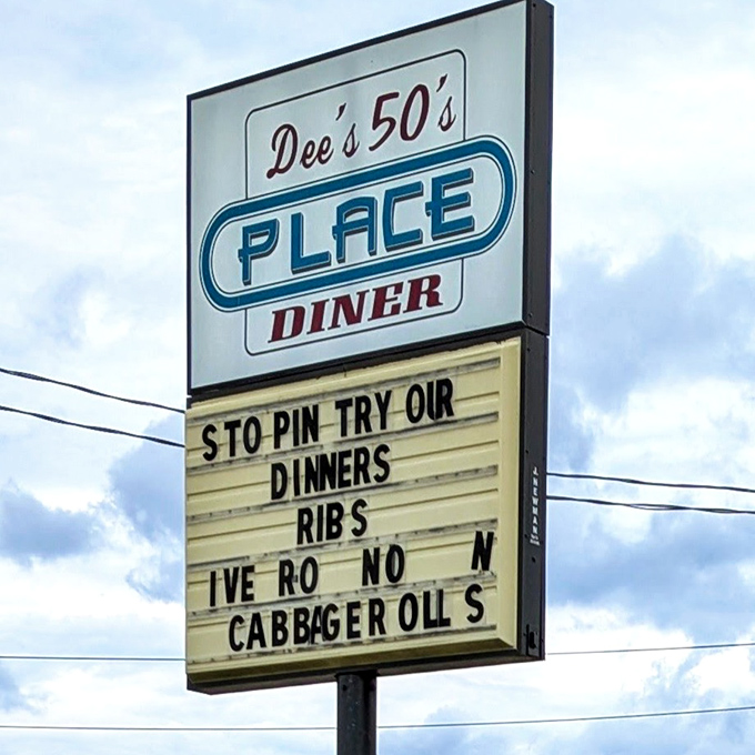 Even the roadside sign has personality&mdash;"Live Rock 'N' Cabbage Roll" is pure diner humor gold.