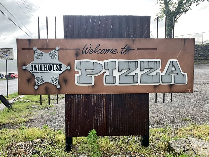 The welcome sign promises pizza justice for all. That sheriff's star logo lets you know you're in for some serious flavor enforcement.