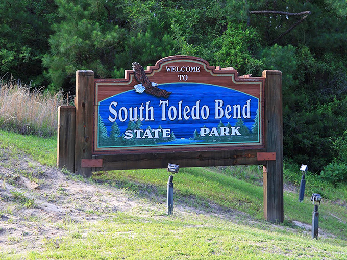 Welcome sign that might as well say "Paradise Entrance." The eagle knows what you're about to discover &ndash; pure Louisiana magic.