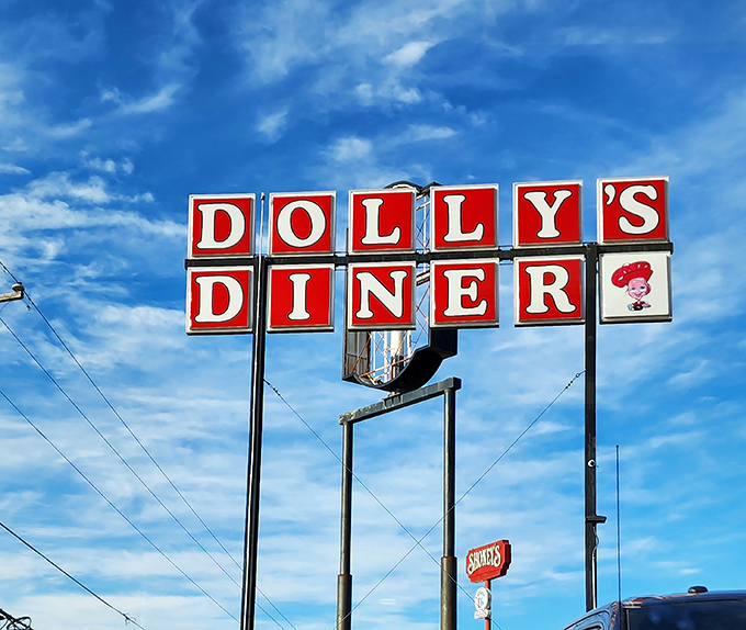 Against that perfect West Virginia blue sky, Dolly's sign stands as a landmark more reliable than GPS and twice as rewarding.