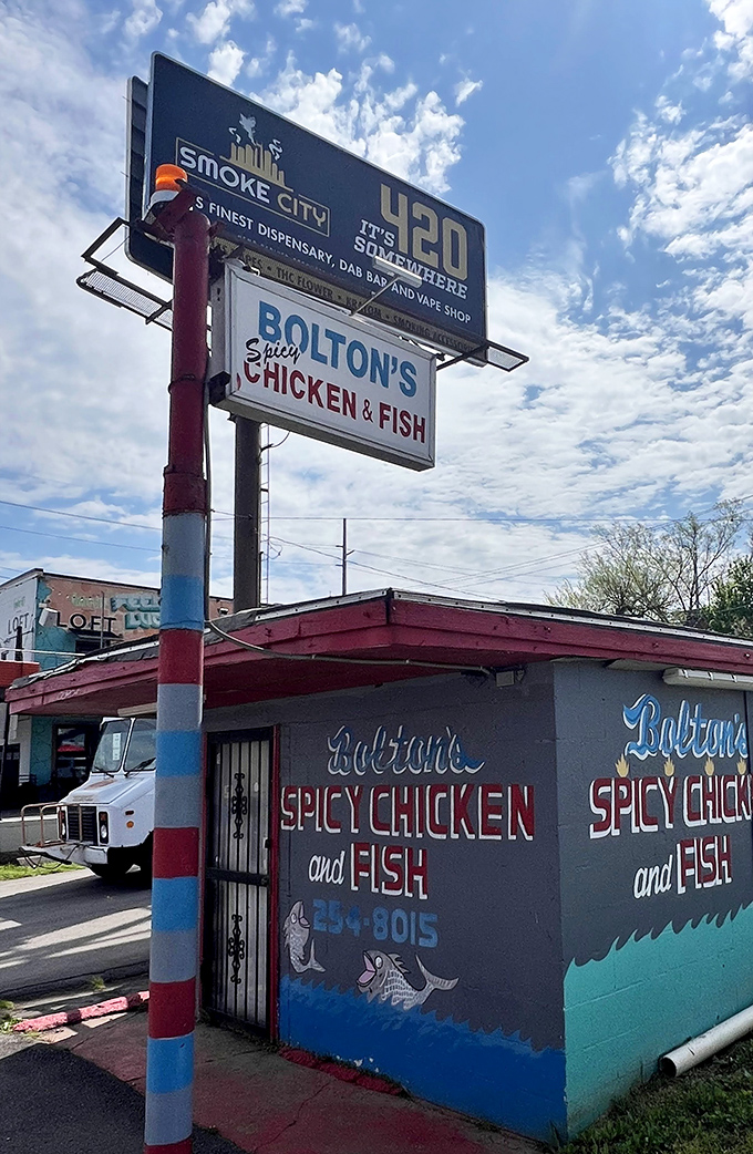 The sign stands as both invitation and warning: enter for legendary Nashville hot chicken, but proceed with both courage and napkins.