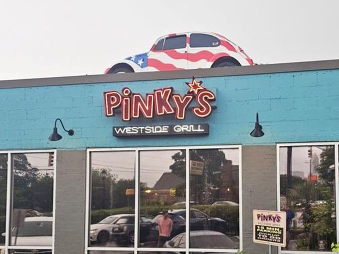 The American flag VW Bug isn't just roof decoration – it's a beacon guiding hungry travelers to a promised land of creative comfort food and zero pretension.