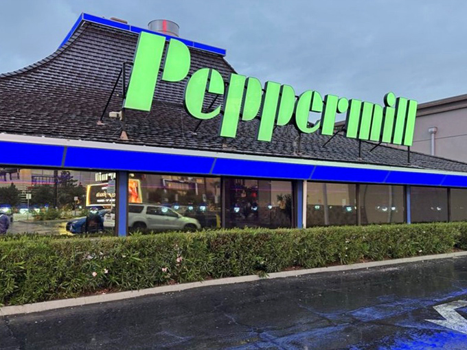 By day, the Peppermill's green and blue signage might seem understated. By night, it glows with the promise of 24-hour indulgence in a city that never sleeps.