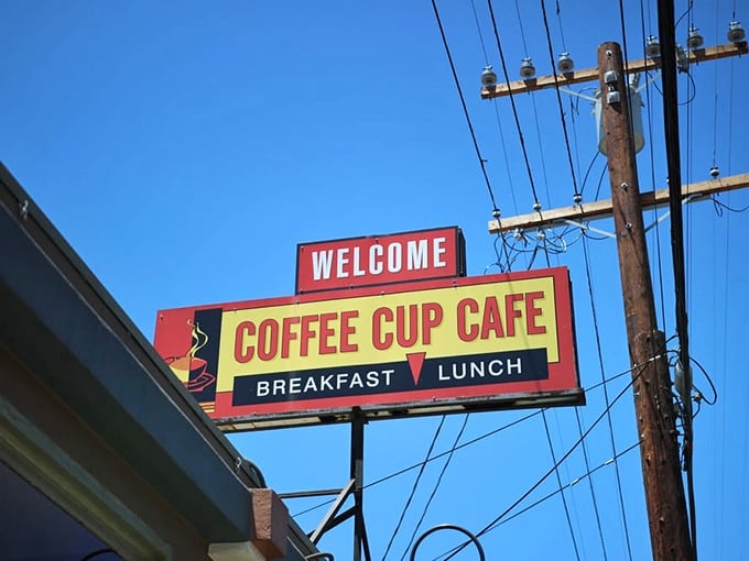A sign that promises exactly what it delivers – welcome, coffee, and unforgettable meals. No false advertising here, just straightforward breakfast brilliance.