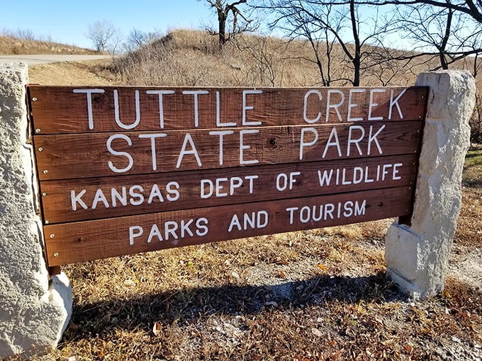 The wooden sign announces your arrival to paradise &ndash; no neon lights needed when the surrounding natural attractions do all the talking.