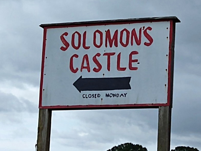 The sign points the way with refreshing directness. No fancy GPS needed—just follow the arrow and prepare for Monday disappointment.