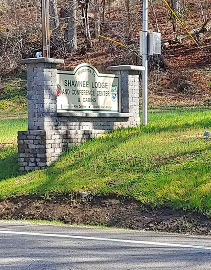 The welcoming sign to Shawnee Lodge, where wilderness comfort isn't an oxymoron but a promise kept.