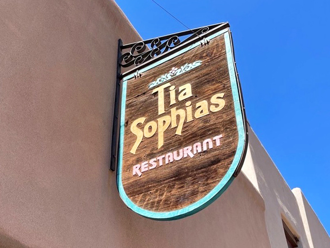 The iconic sign against Santa Fe's brilliant blue sky&mdash;a beacon for breakfast pilgrims. Some people chase stars; the wise chase this wooden shield. 