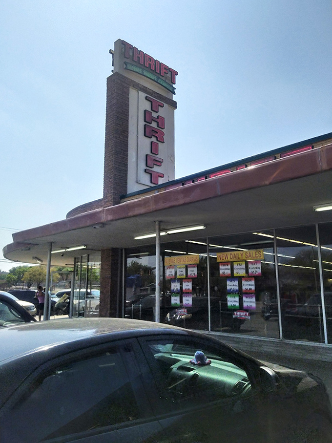 The iconic tower stands like a lighthouse for bargain seekers, guiding thrifty souls to safe harbor from retail's stormy seas.