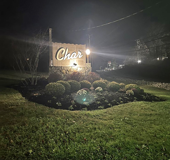 By night, The Char's sign glows with promise against the darkness, a beacon for those seeking exceptional dining in the heart of West Virginia. 