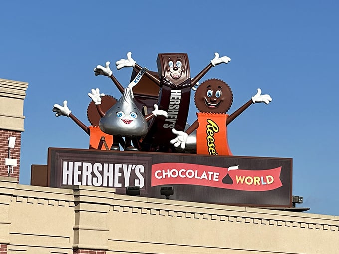 The Hershey's character sign featuring the famous trio&mdash;bar, Kiss, and Reese's&mdash;welcomes visitors with open arms to their chocolate kingdom.