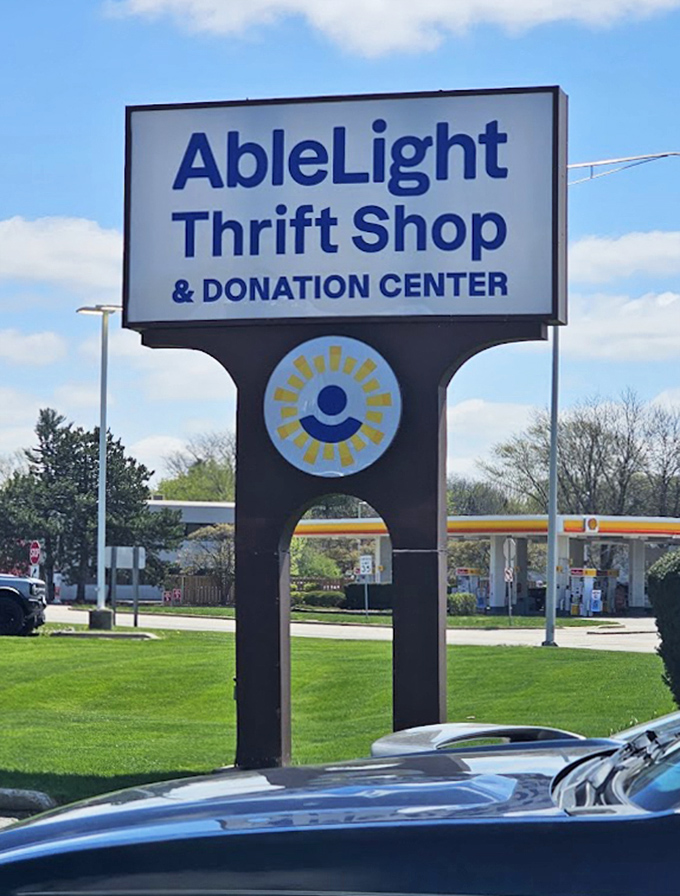 The sign that signals salvation to budget-conscious shoppers and treasure hunters alike&mdash;a beacon of bargains visible from the highway.