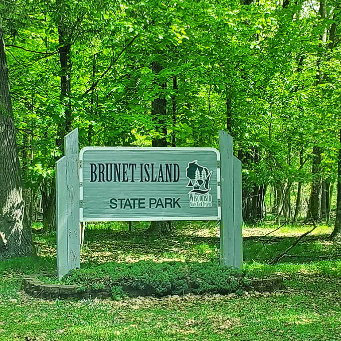 The welcoming sign to Brunet Island State Park &ndash; where the only notification you'll receive is nature's gentle reminder to slow down.