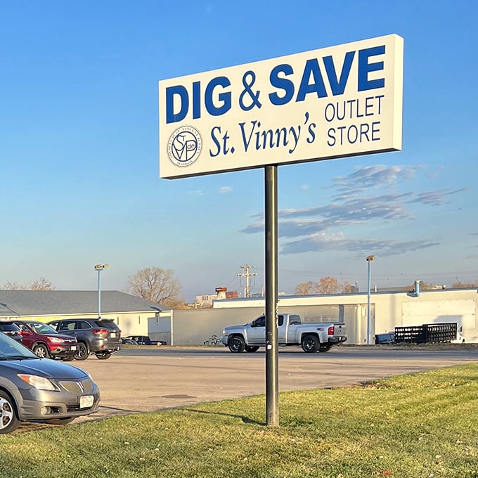 The beacon of bargain hunters everywhere. St. Vinny's sign stands proud against Wisconsin's blue sky, promising adventures within.