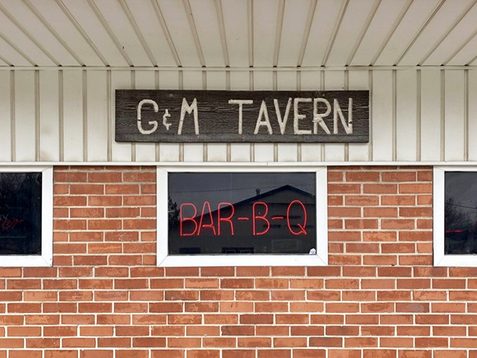 The sign says it all&mdash;no pretense, no gimmicks. Just "G+M TAVERN" and "BAR-B-Q" in neon that's been guiding hungry travelers for generations.