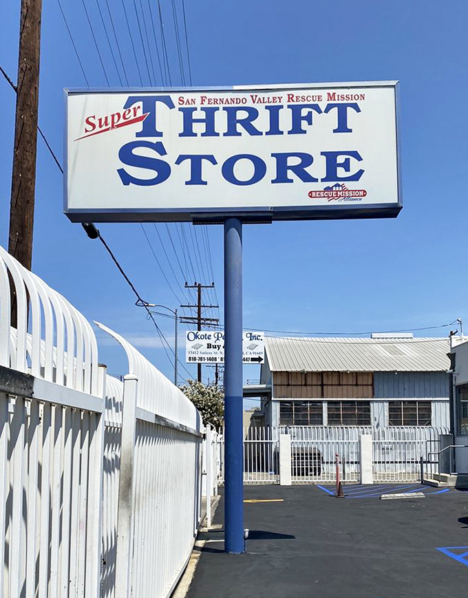 The Super Thrift Store sign stands tall against the California blue sky, a beacon for bargain hunters and sustainable shoppers throughout the San Fernando Valley.