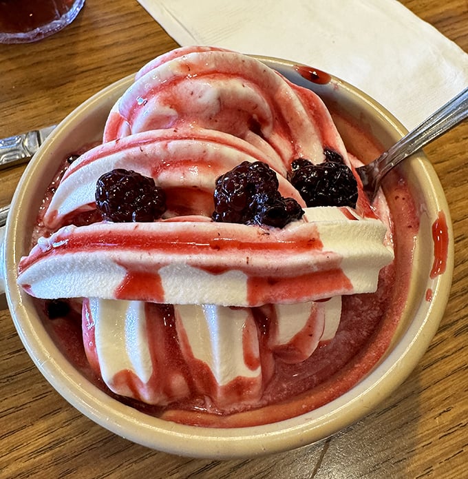 Swirls of soft-serve ice cream with berry sauce and real fruit&mdash;the perfect finale to your buffet marathon and worth every stretchy-pants moment.